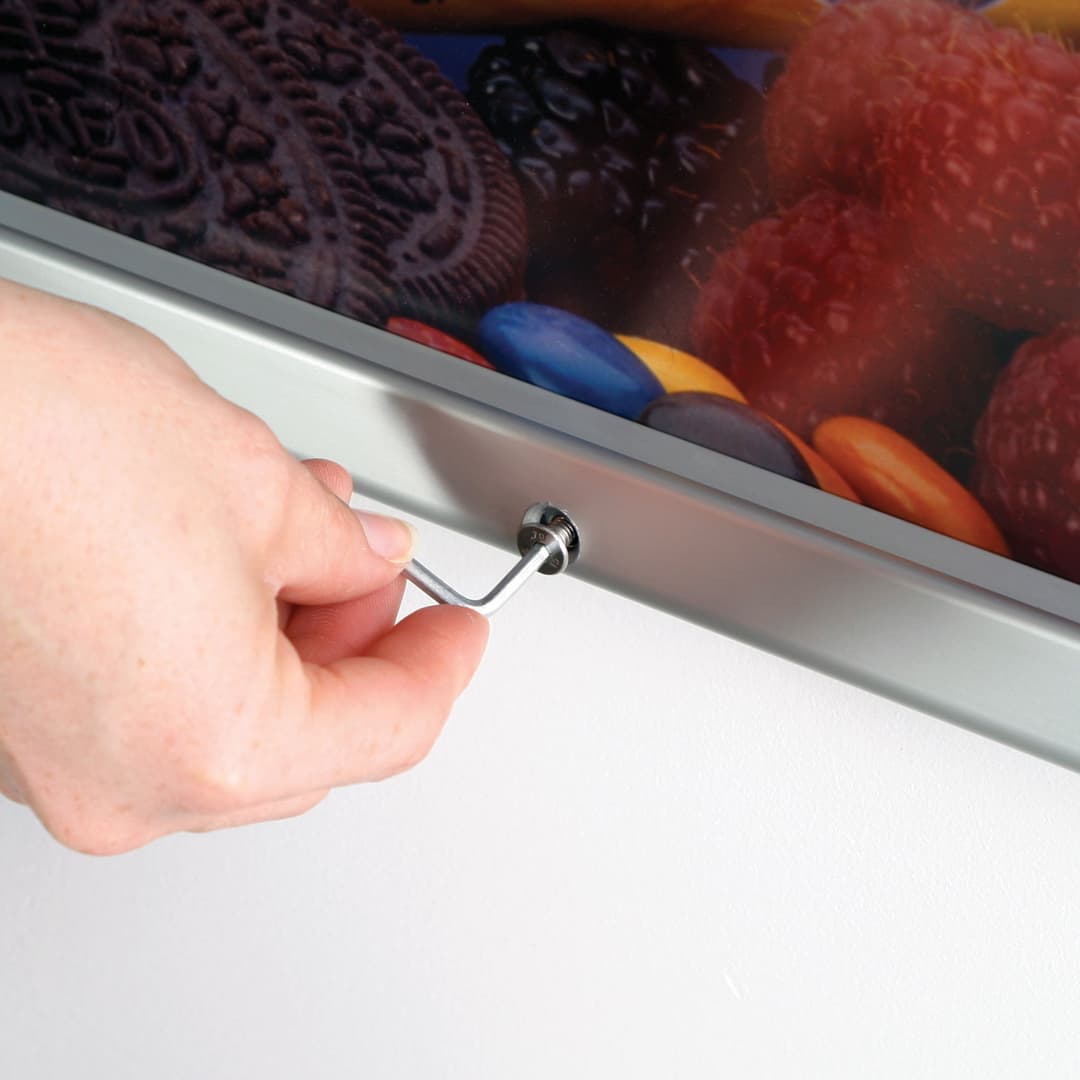 Locking Wall Frames with Snap Edges Keep Graphics Secure | Displays2Go