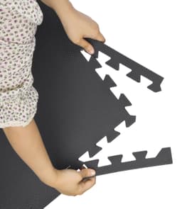Black Foam Trade Show Flooring | Puzzle-Piece Floor Mats | Displays2Go